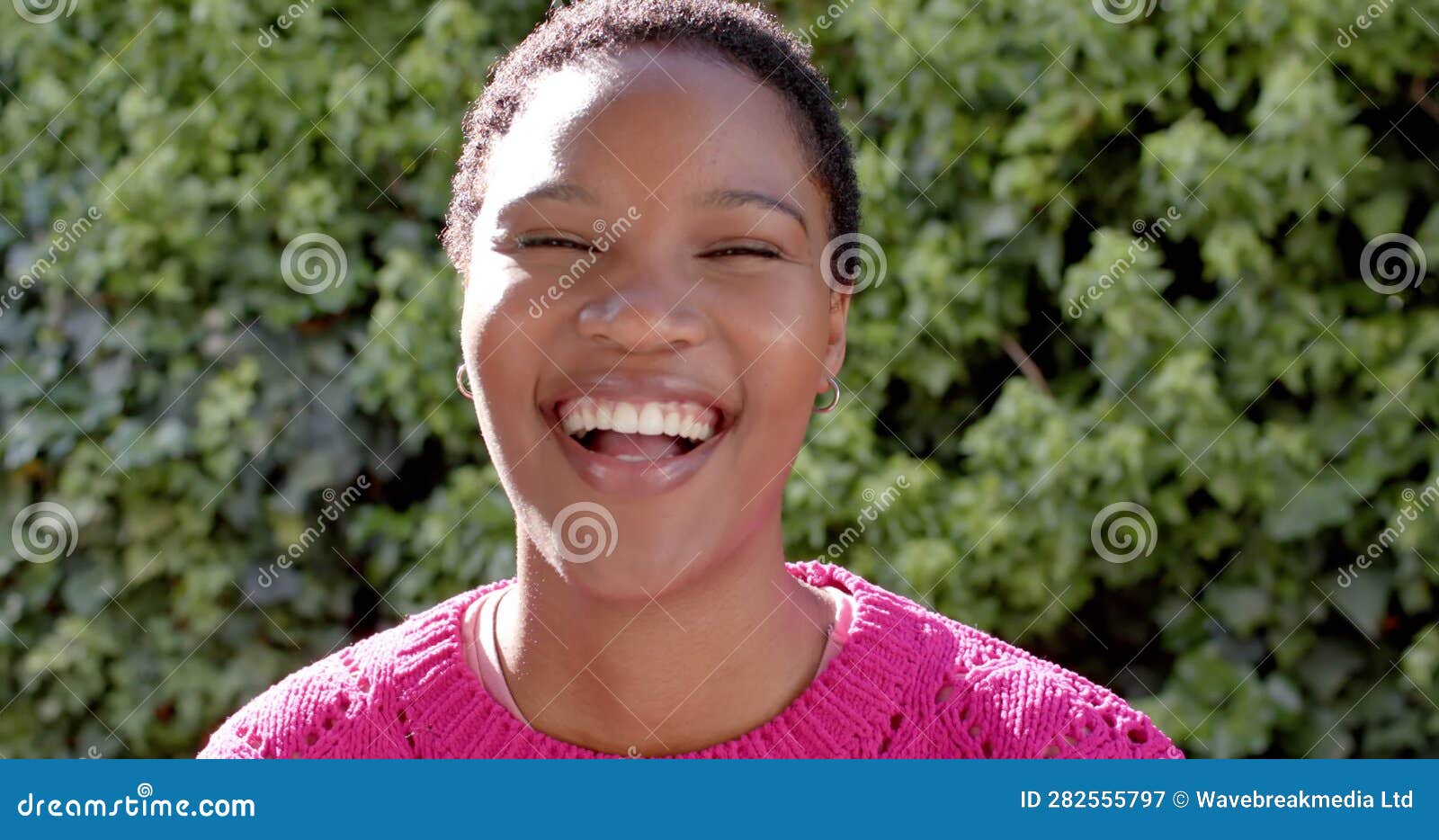 Portrait Of Happy African American Woman In Sunny Garden Slow Motion