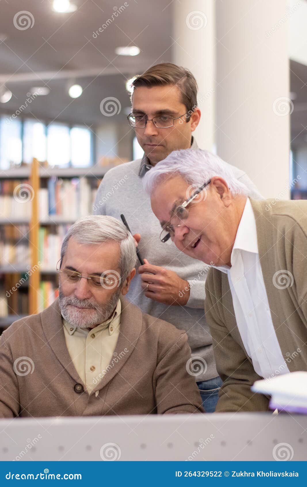 Portrait of Happy Aged Men Studying with Instructor Stock Photo - Image ...