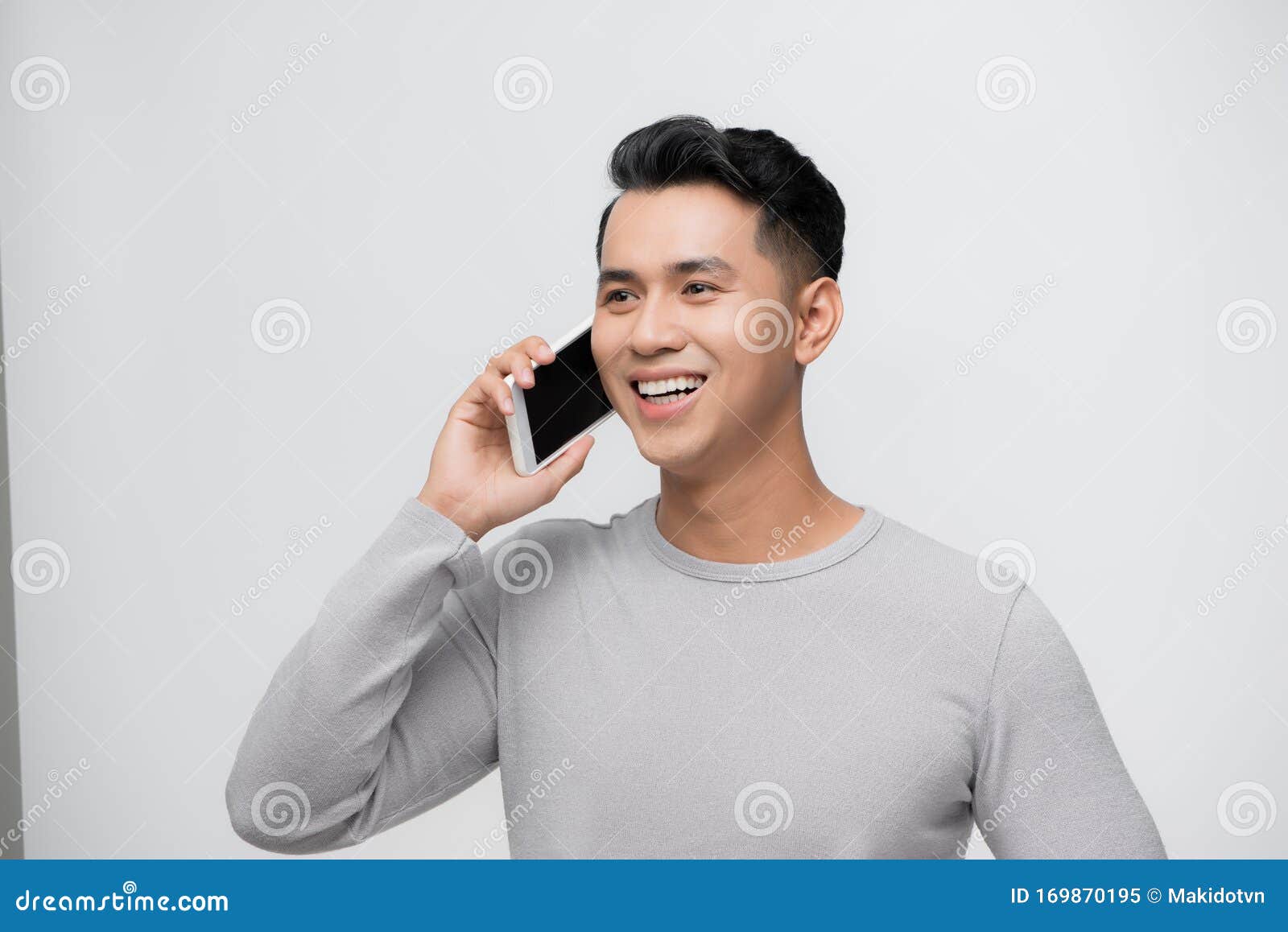Portrait of Happy Asian Man Talking on a Smartphone on White Stock ...