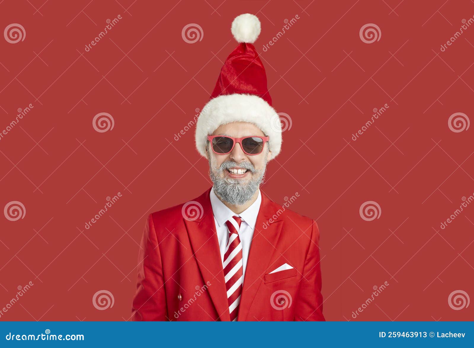 Portrait Of Happy Bearded Man Wearing Red Suit Sunglasses And Funny