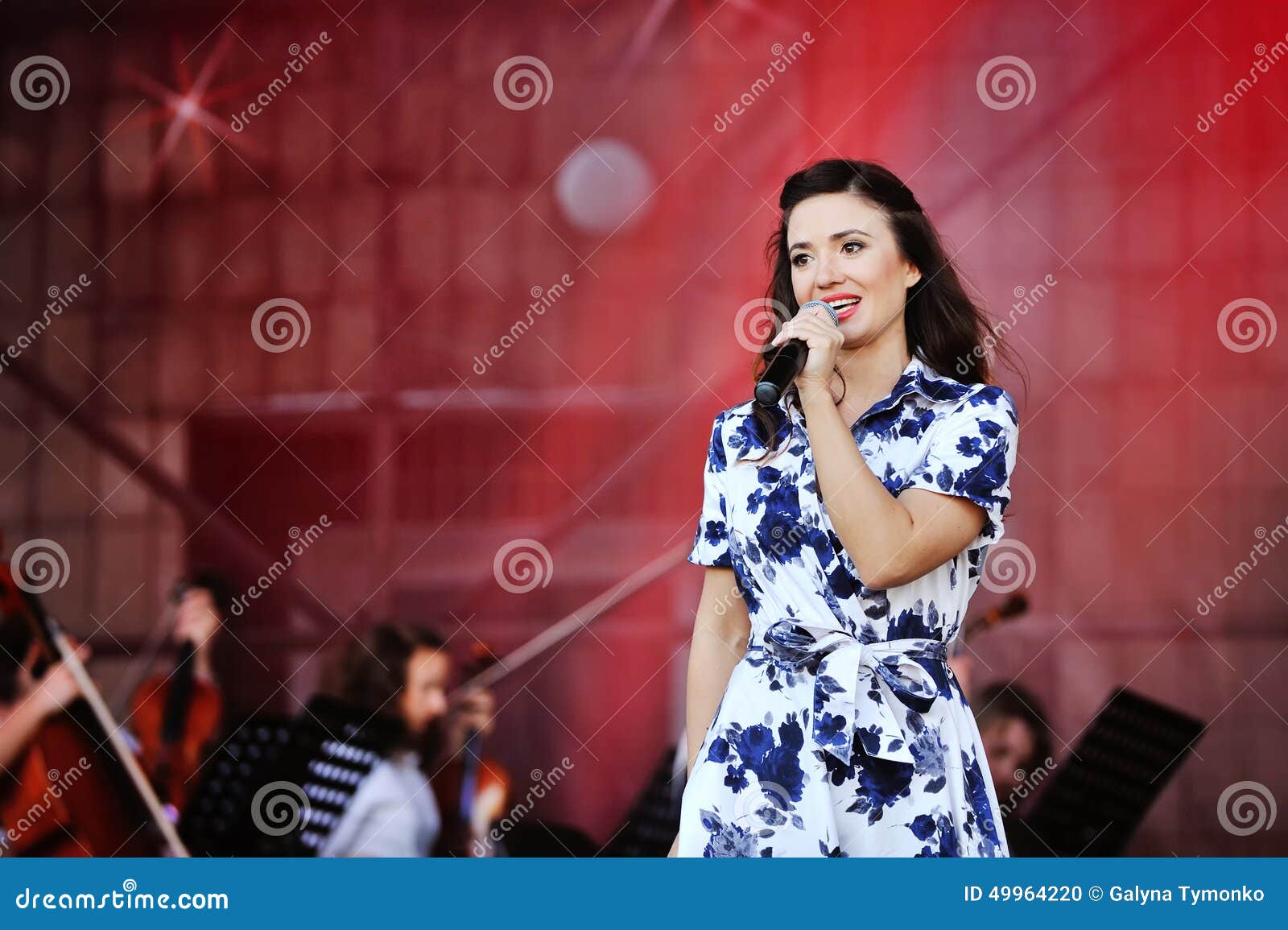 Portrait of a Happy Beautiful Woman on Stage with Microphone Stock ...