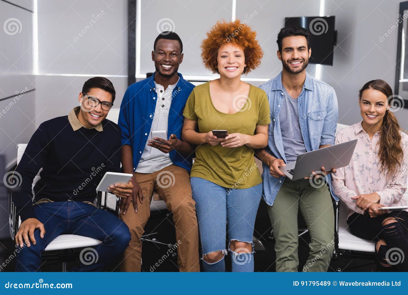 Portrait of Happy Business Colleagues Using Various Technologies Stock ...