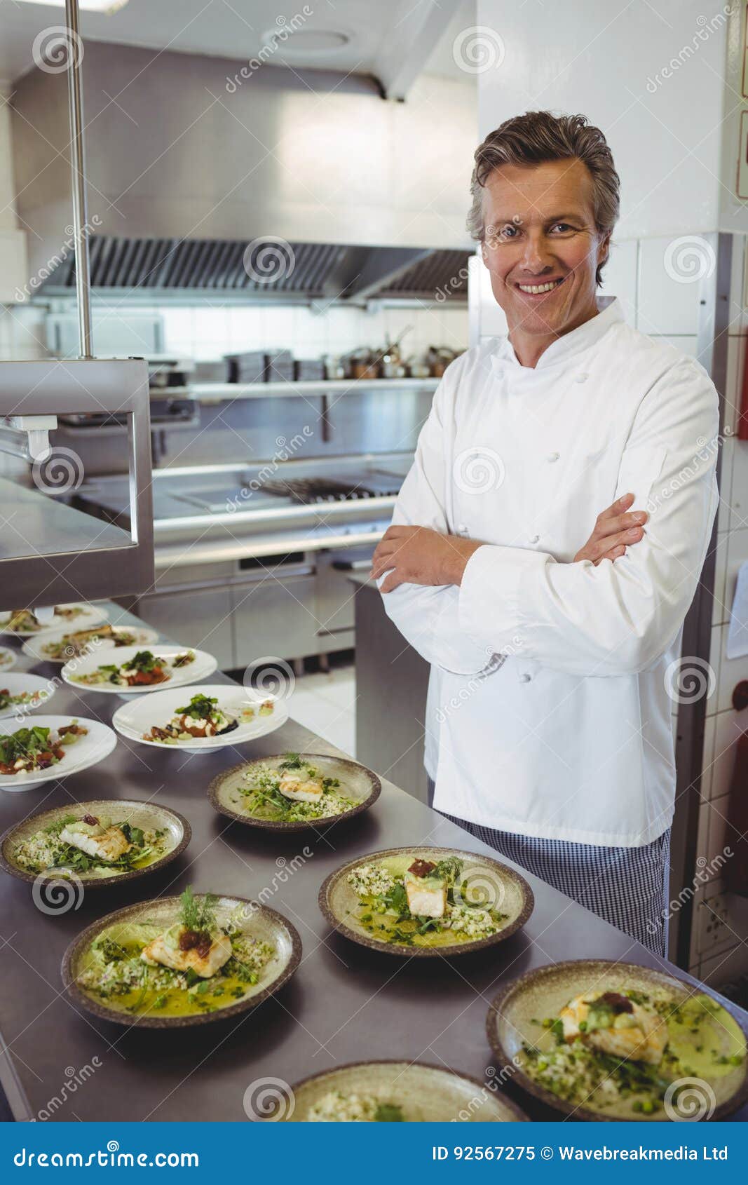 Portrait of Happy Chef with Appetizer Plates at Order Station Stock ...