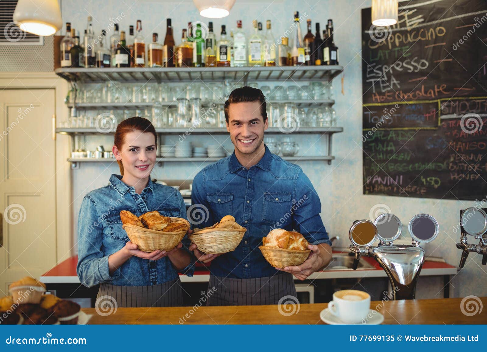 Portrait of Happy Co-workers with Breads at Cafe Stock Image - Image of ...