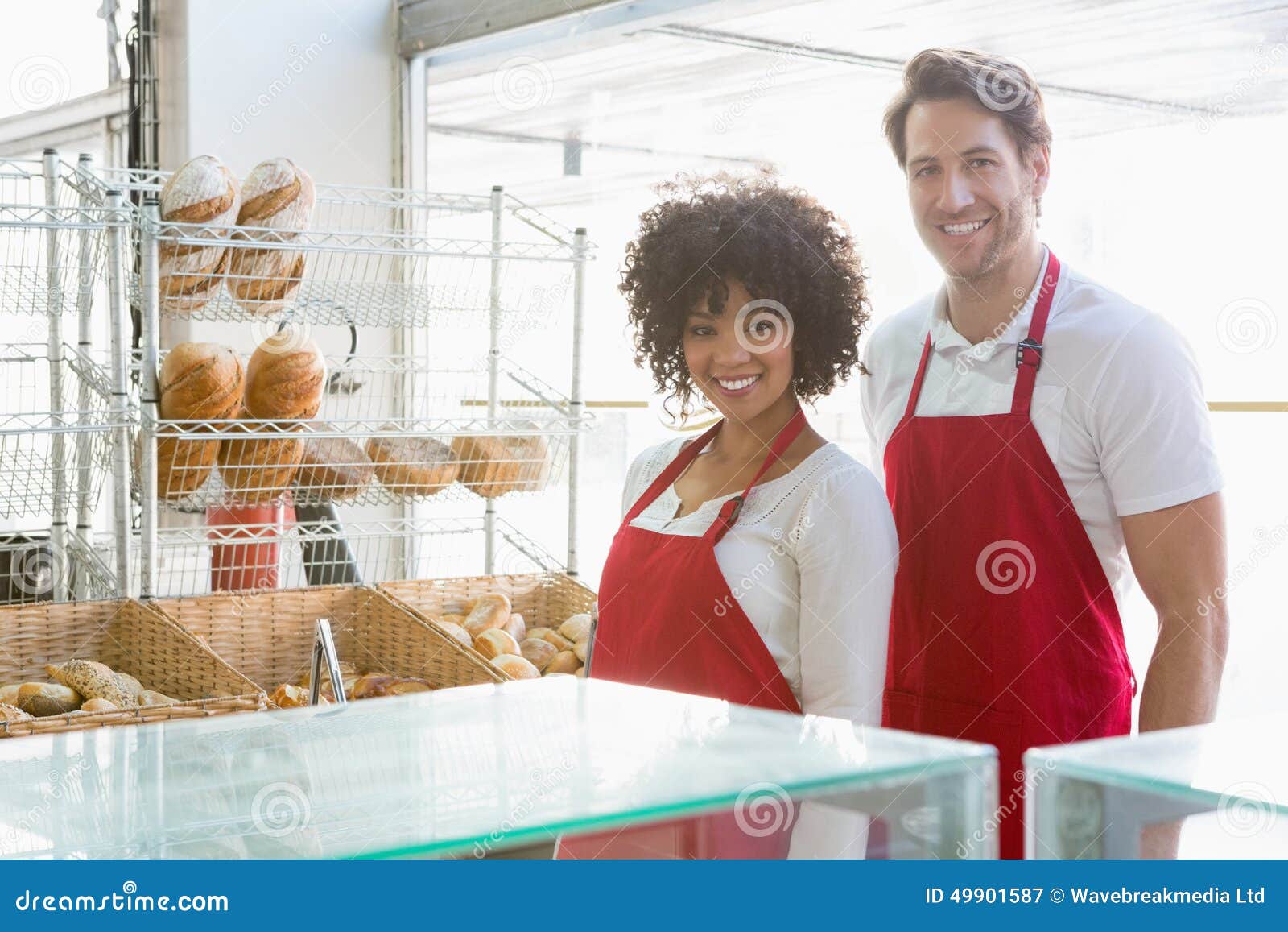 Portrait of Happy Co-workers Standing Behind the Counter Stock Image ...