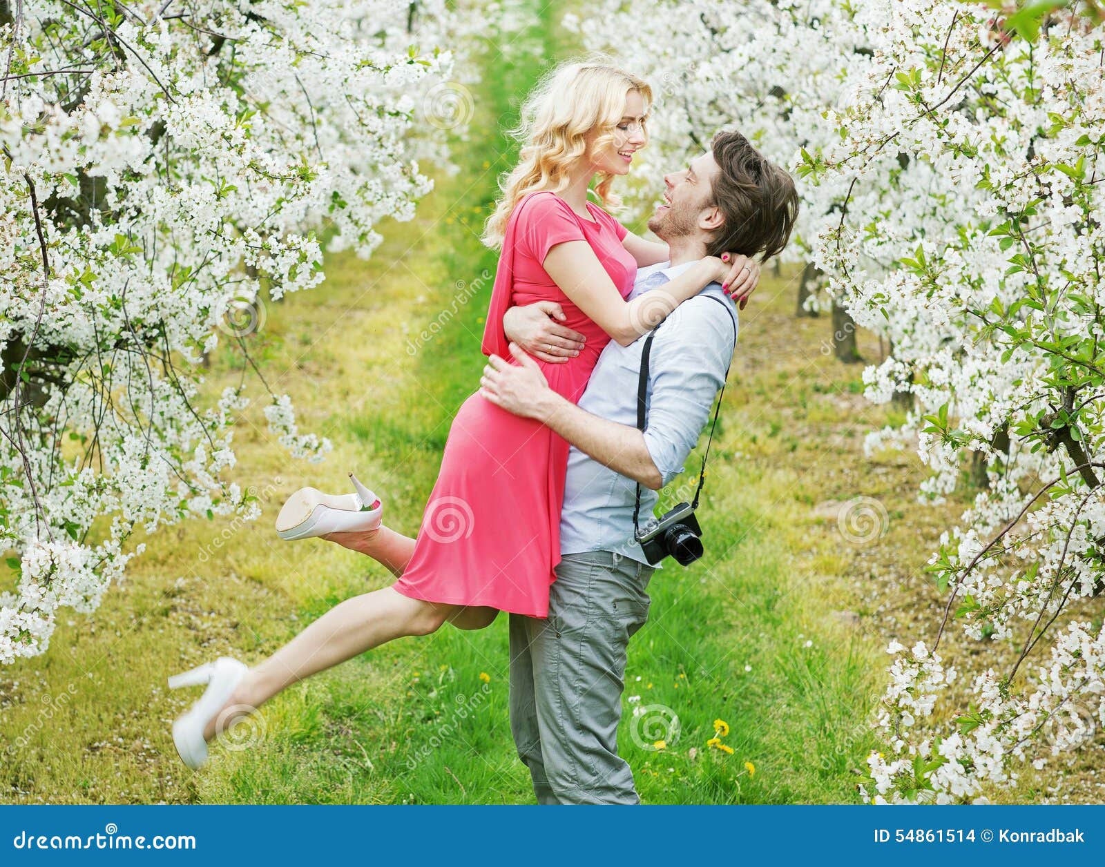 Portrait of a Happy Cuddling Couple Stock Photo - Image of dandelion ...