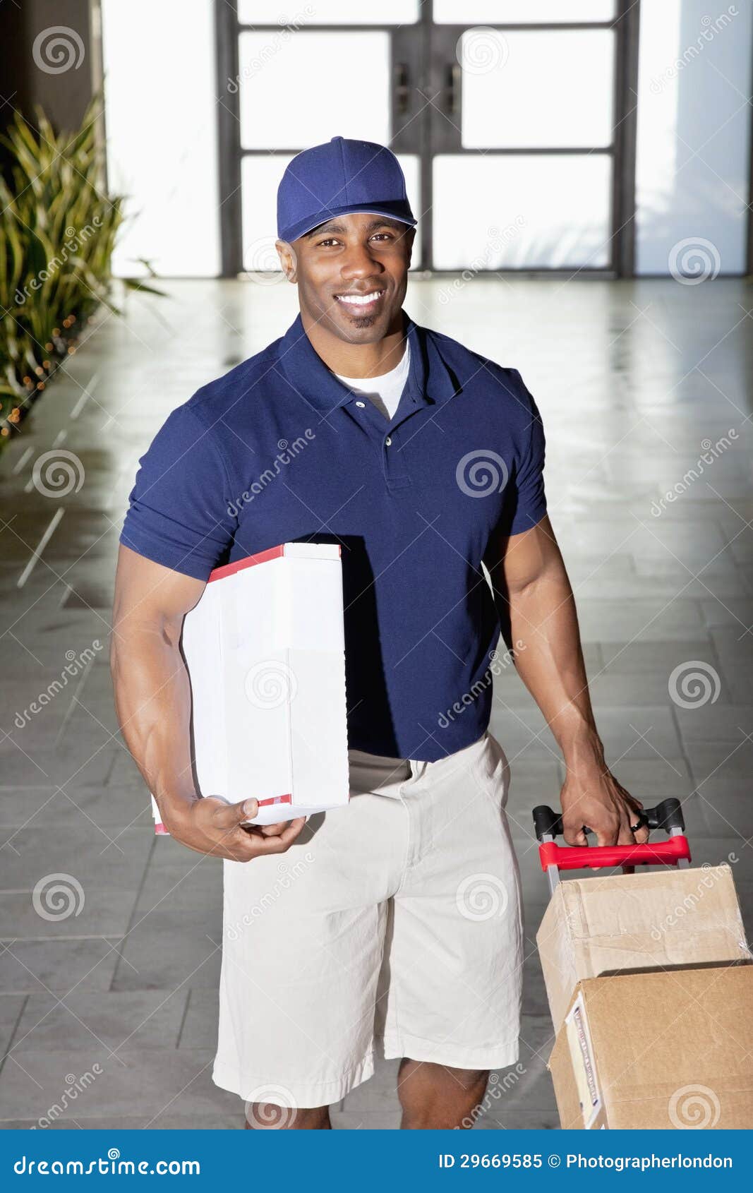 Portrait of a Happy Delivery Man with Packages Stock Image - Image of ...