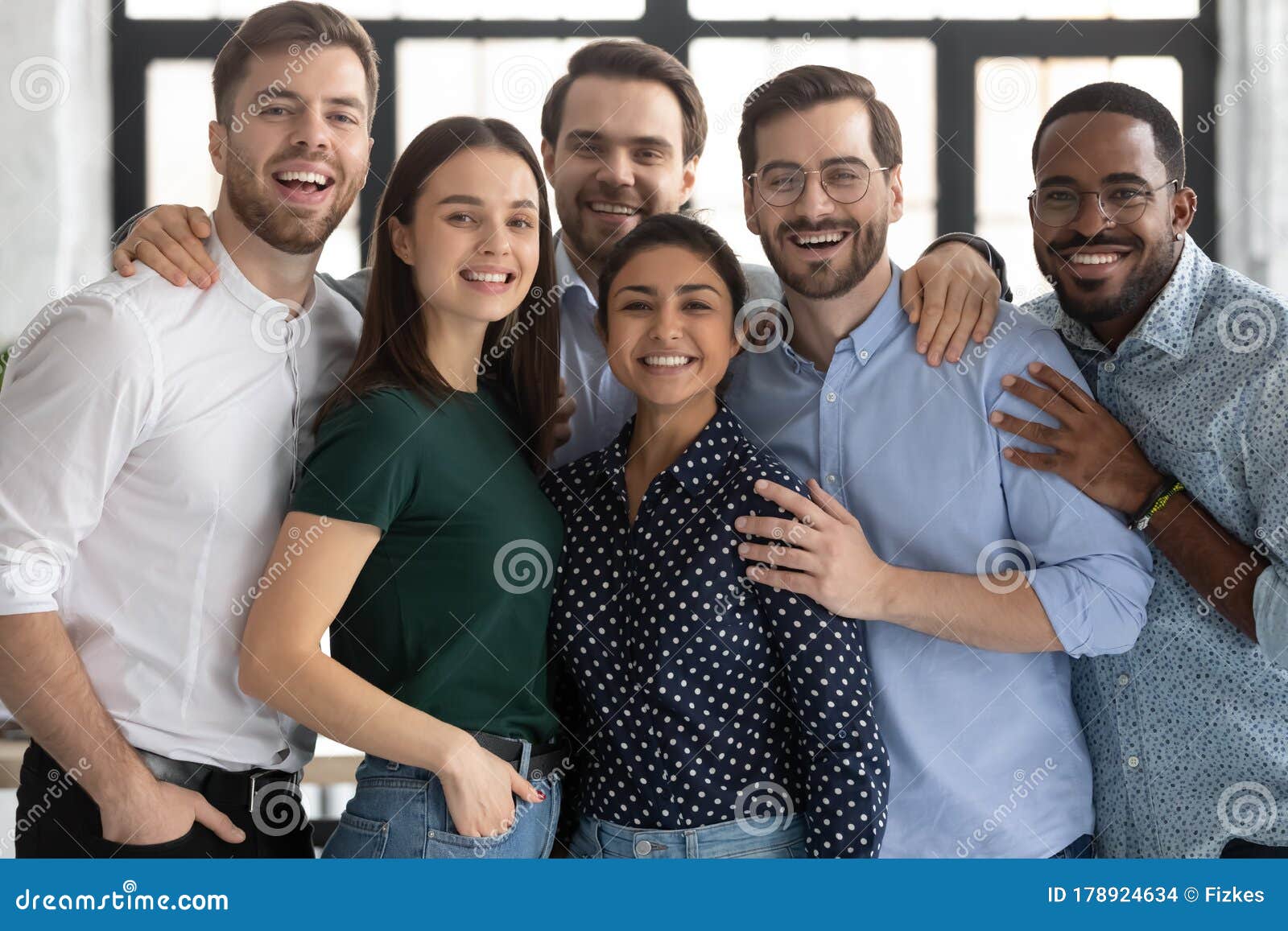Portrait of Happy Diverse Colleagues Posing Together in Office Stock ... Portrait of Happy Diverse Colleagues Posing Together in Office Stock ...