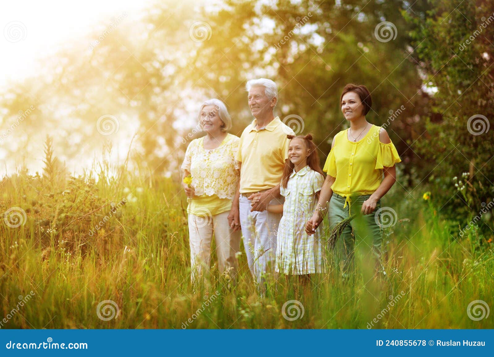 Portrait of Happy Family Posing in Field Stock Photo - Image of child ...
