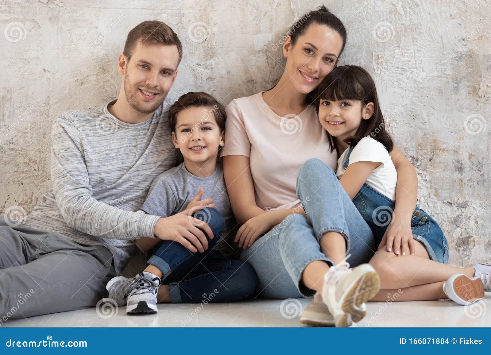 Portrait of Happy Family with Two Children on Gray Background. Stock ... Portrait of Happy Family with Two Children on Gray Background. Stock ...