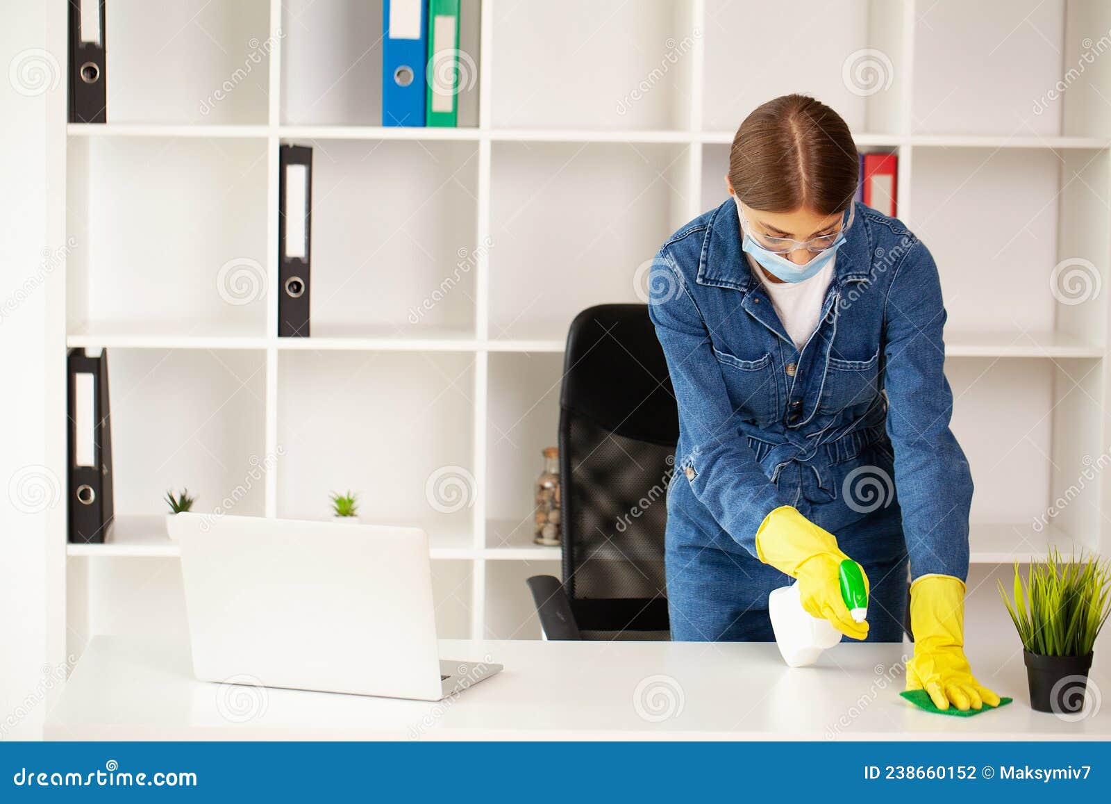 Portrait of Happy Female Worker Cleaning Computer Desk Stock Photo ...