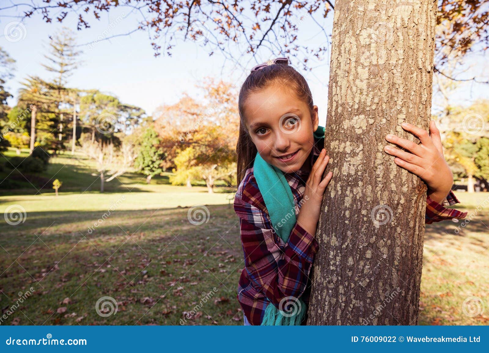 Portrait of Happy Girl Hugging Tree Stock Photo - Image of cheerful ...