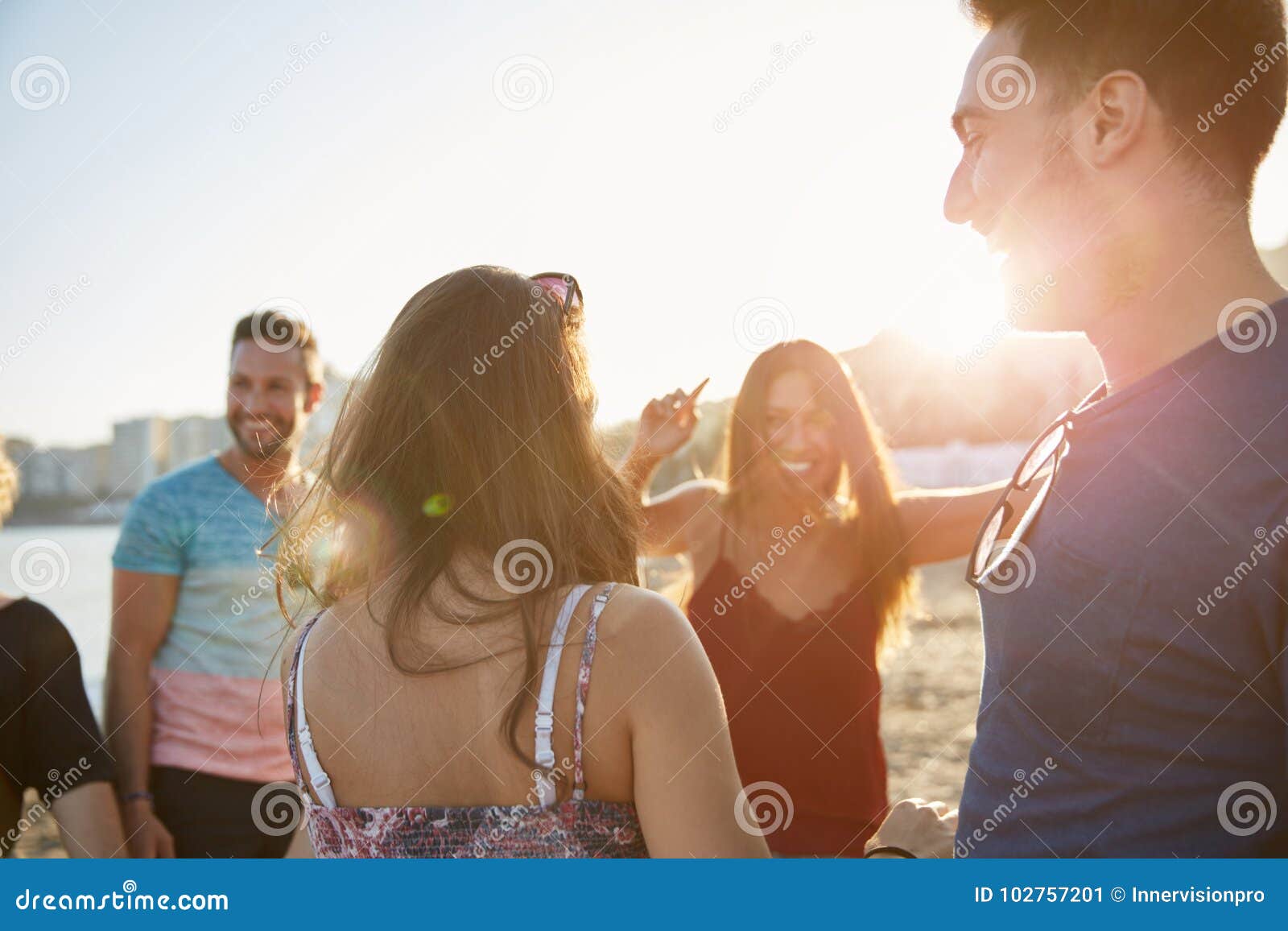 Happy Group of Friends Dancing on Beach Stock Image - Image of ...