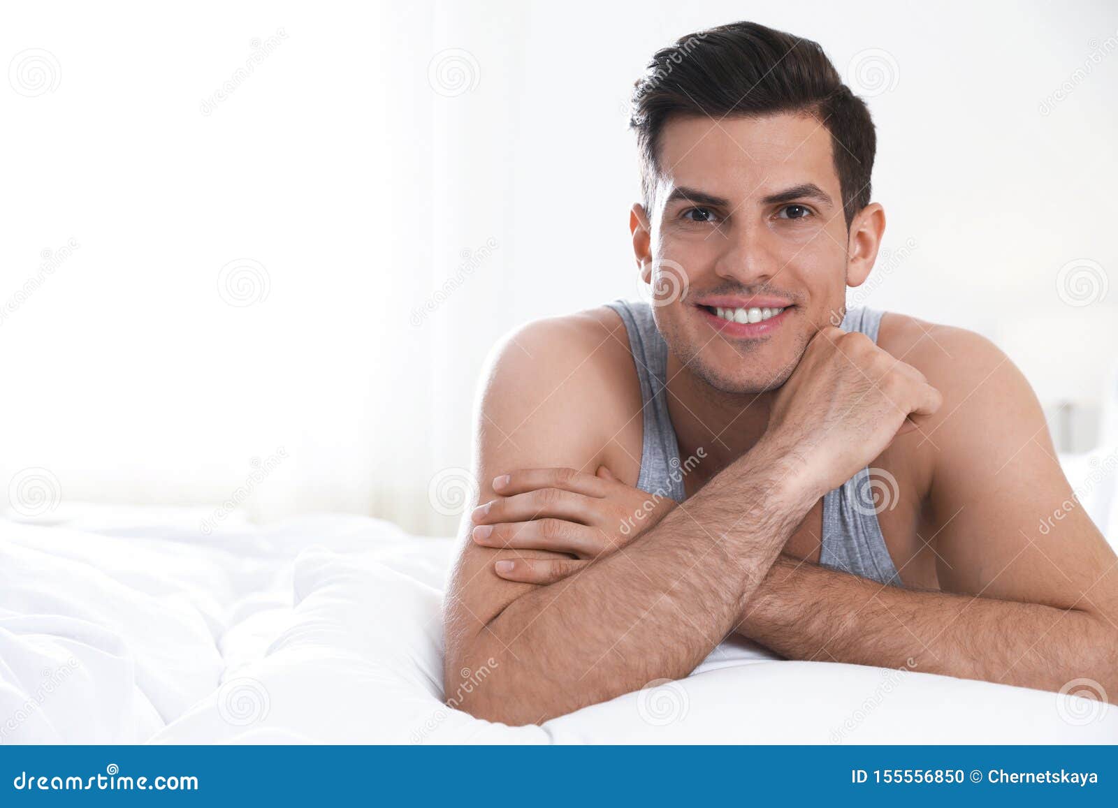 Portrait of Happy Handsome Man Lying on Bed Stock Photo - Image of ... Portrait of Happy Handsome Man Lying on Bed Stock Photo - Image of ...