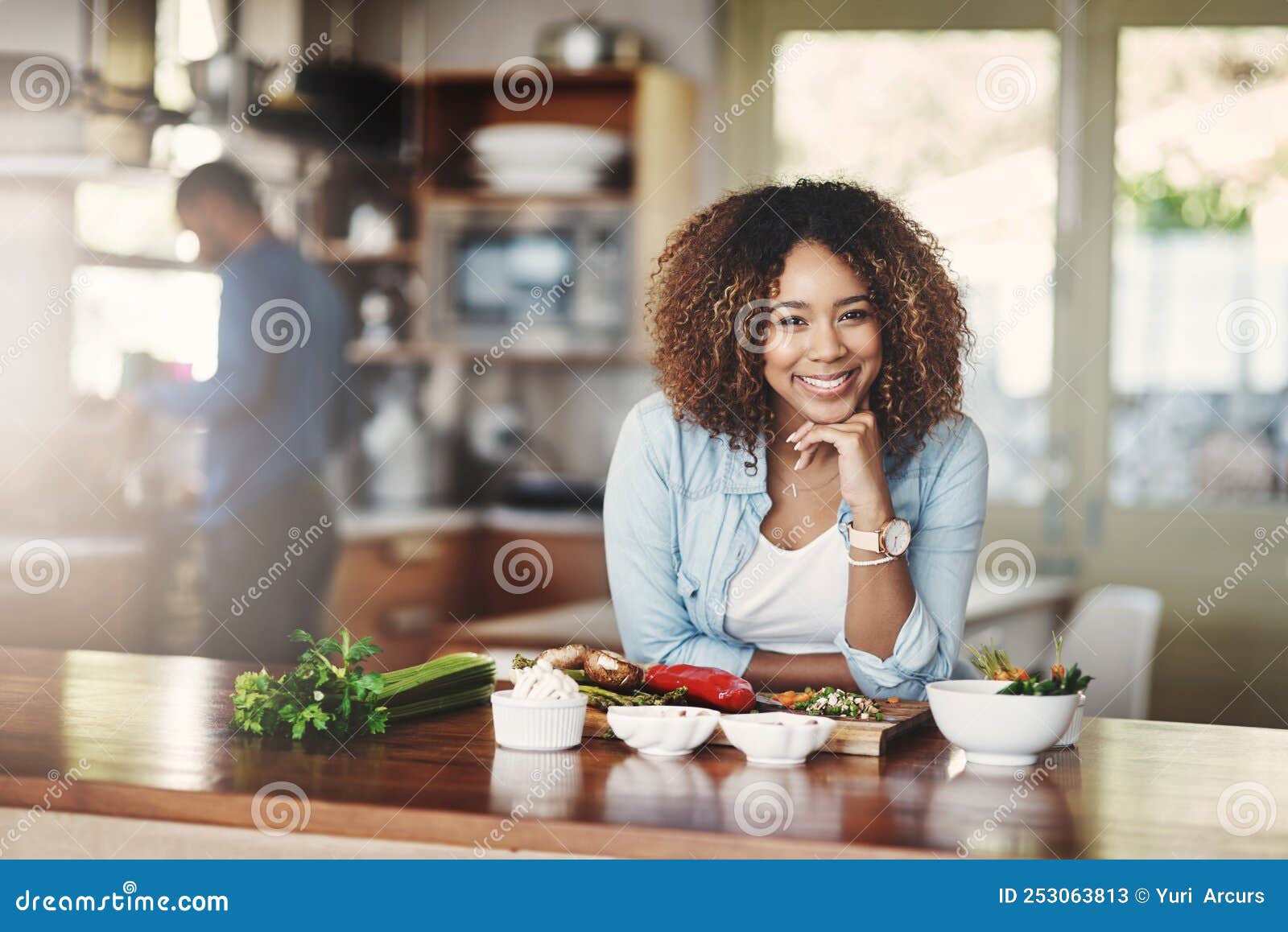 Portrait Of A Happy Healthy And Carefree Young Woman Preparing A