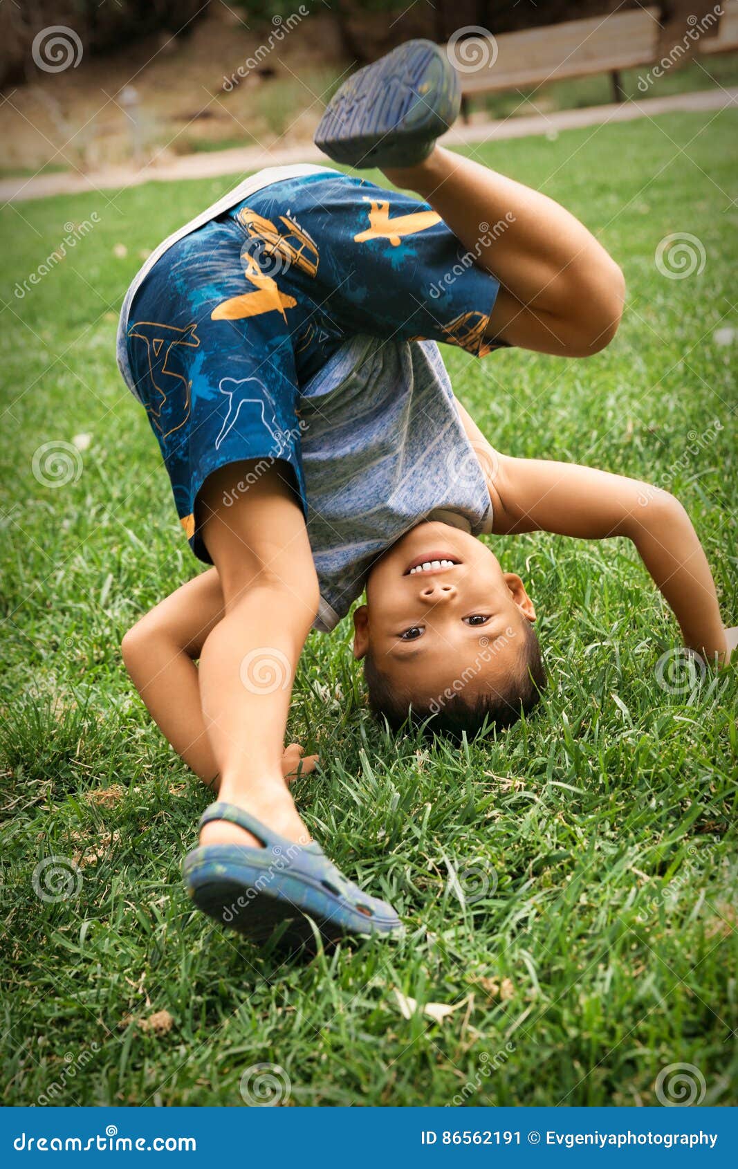 Portrait of Happy Kid Playing Upside Down Stock Image - Image of ...