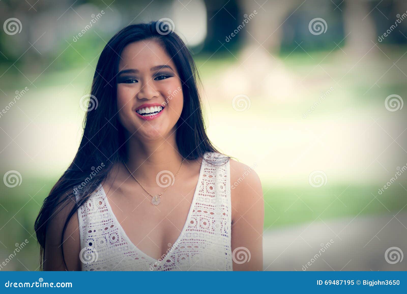 Portrait Of A Happy Laughing Asian Young Woman Filter Stock Image