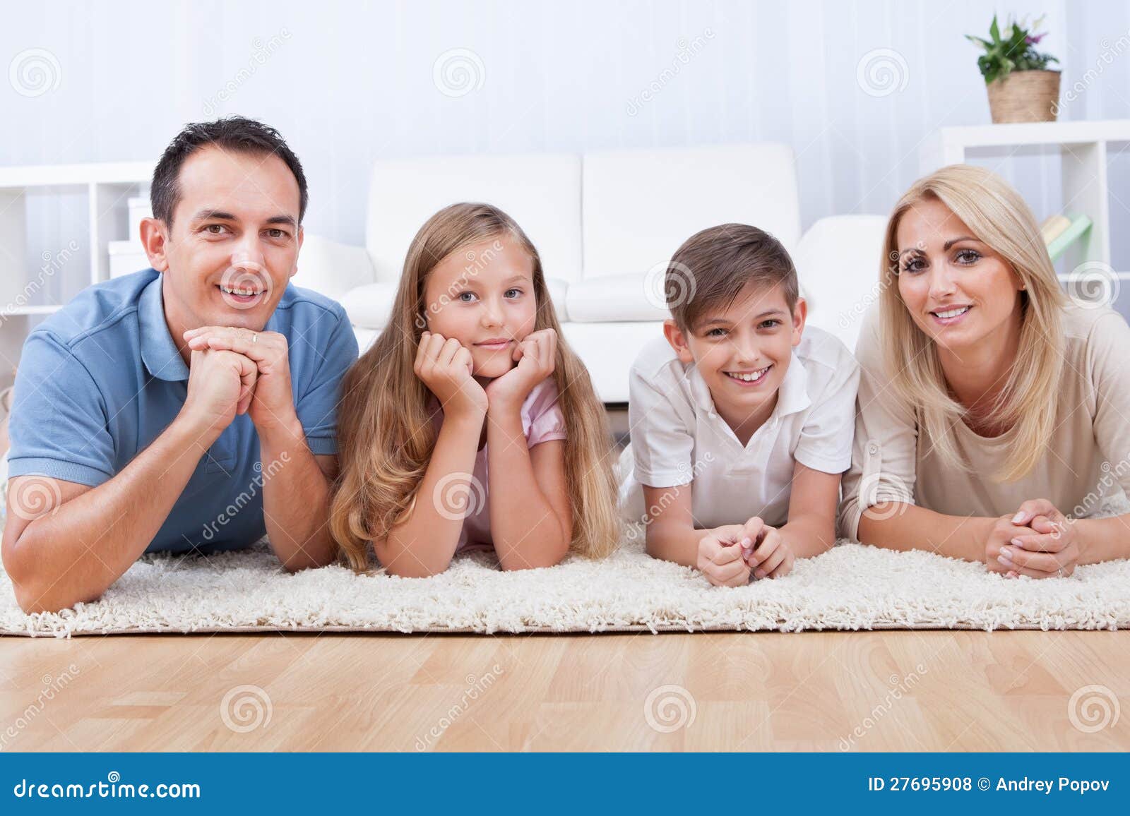 Portrait of Happy Laying on Carpet Stock Photo - Image of adult ...
