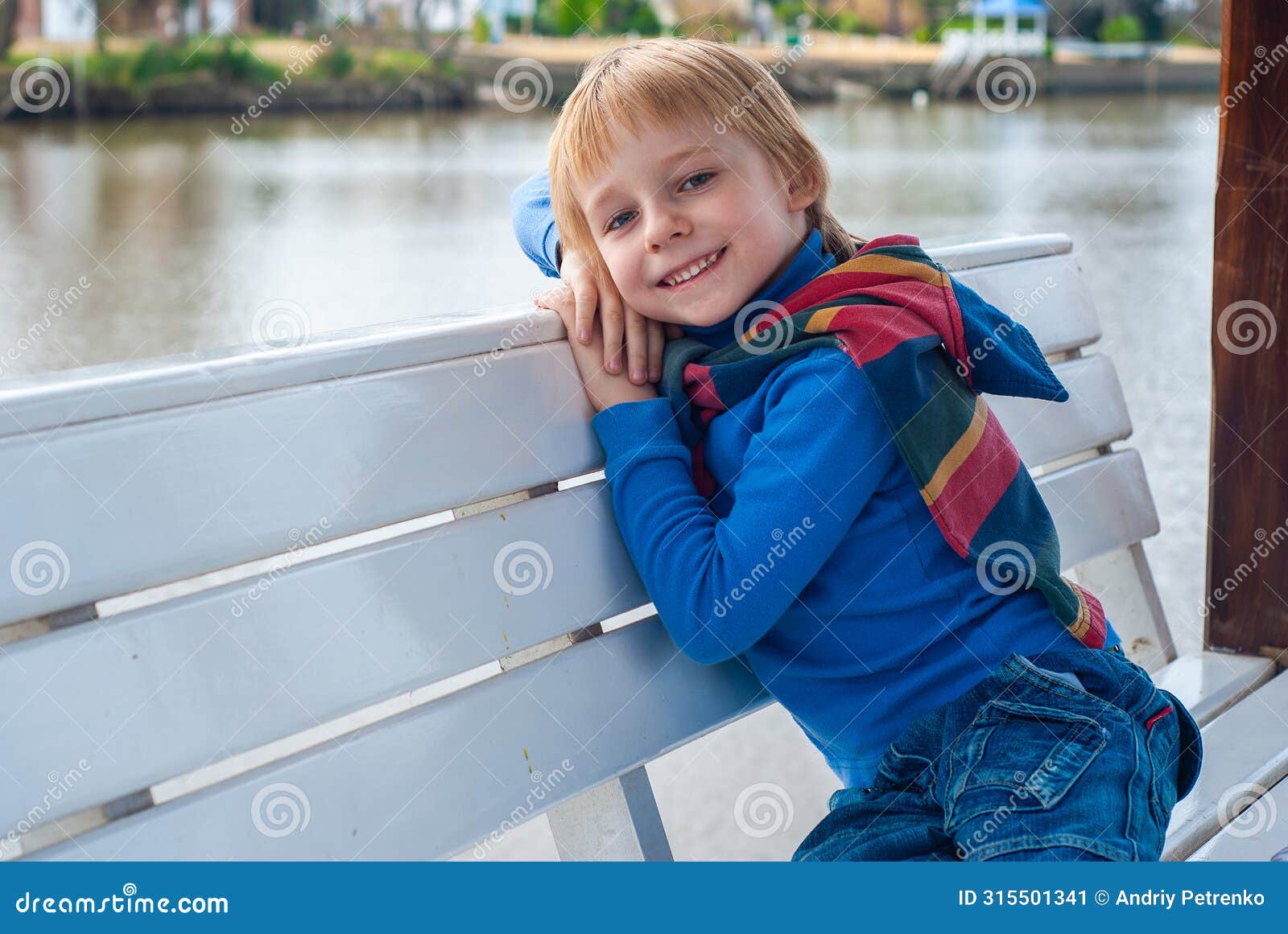 Portrait of a Happy Little Boy on a Bench Stock Image - Image of ...