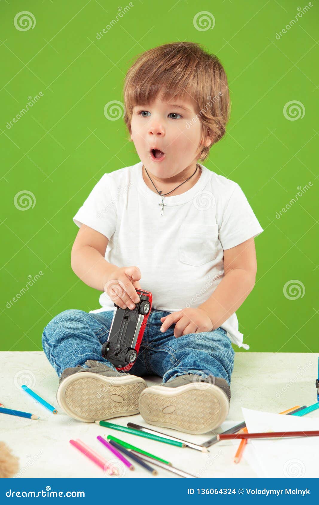 Portrait Of Happy Little Boy Over Green Background Stock Photo - Image ...