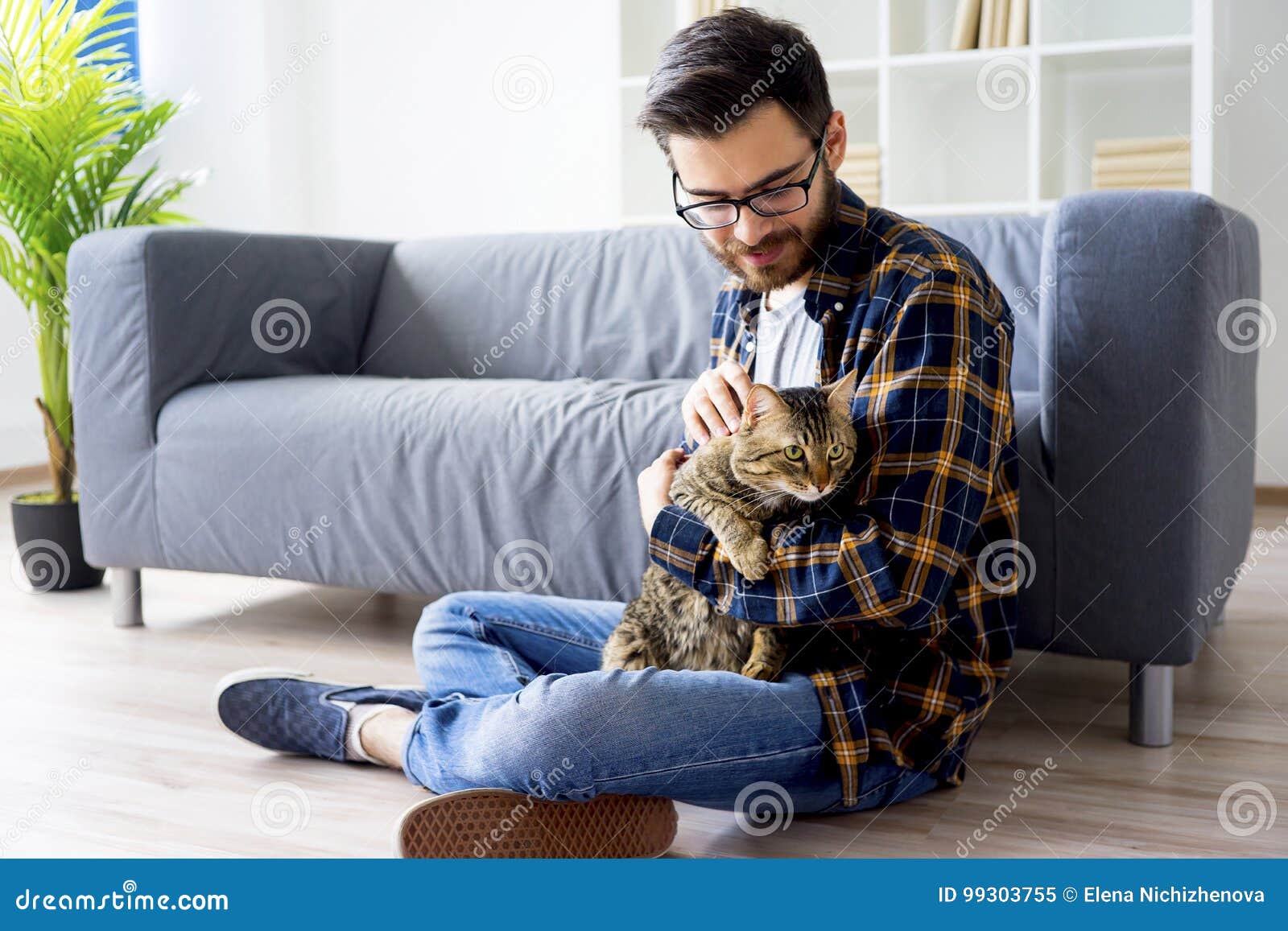 Man with a cat stock image. Image of daughter, parenting - 99303755
