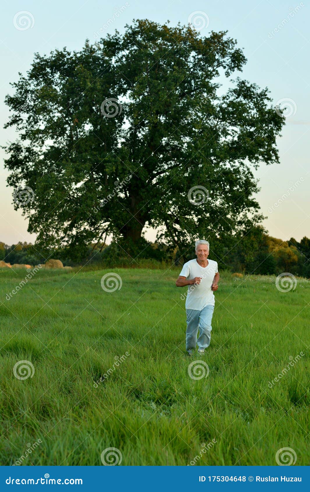 Portrait of Happy Man Running in Summer Field Stock Photo - Image of ...