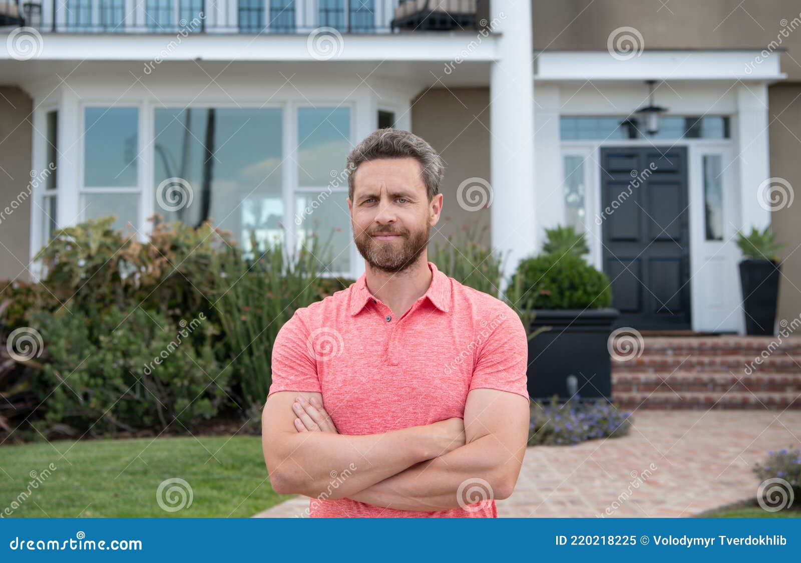 Portrait of a Happy Man Standing Outside House. Stock Image - Image of ...