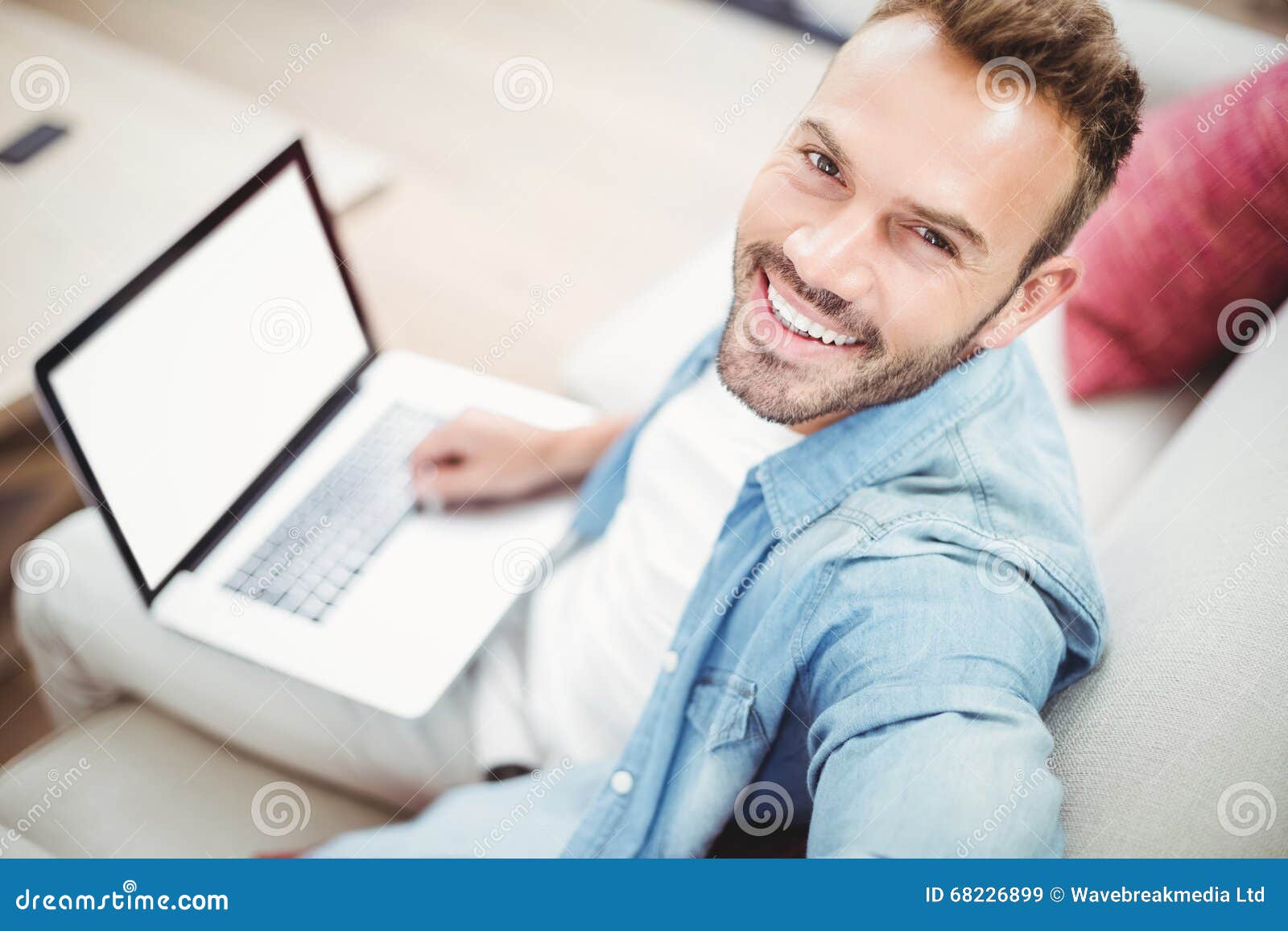Portrait of Happy Man Using Laptop on Sofa Stock Image - Image of ...