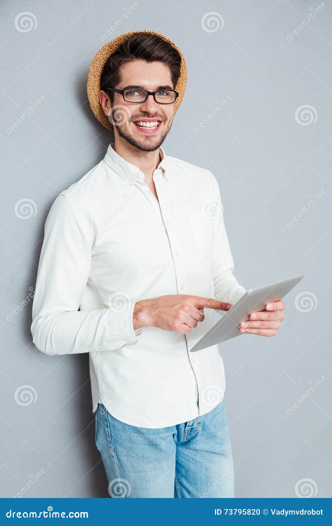 Portrait of a Happy Man Using Tablet Computer Stock Photo - Image of ...