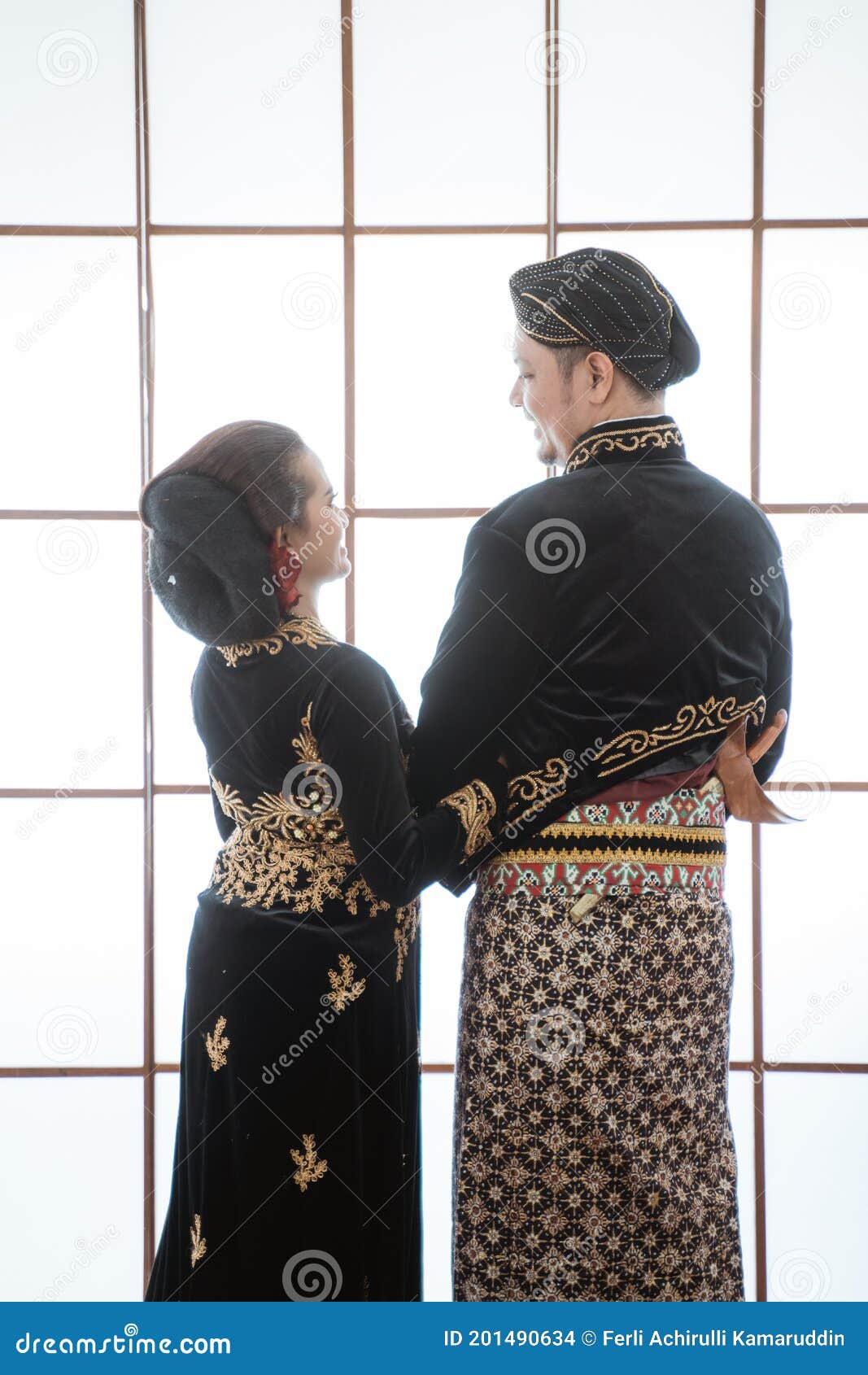 Portrait Happy Men And Women Wearing Javanese Traditional Clothes