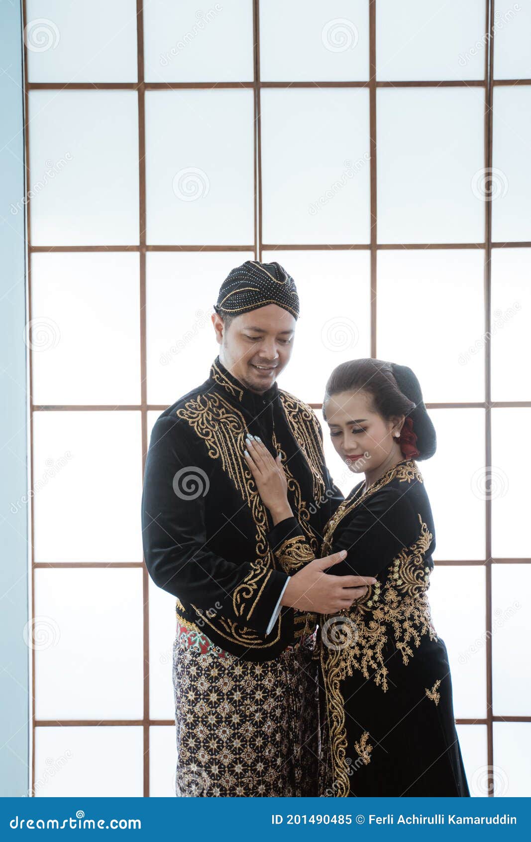 Portrait Happy Men And Women Wearing Javanese Traditional Clothes