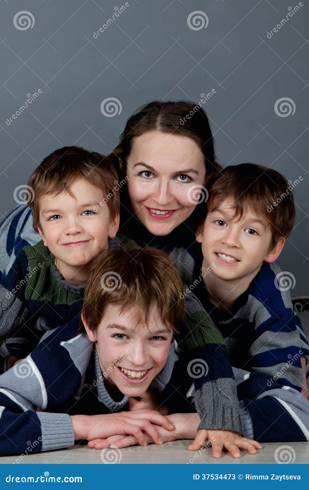 Portrait of Happy Mother and Three Sons, Studio Stock Image - Image of ...