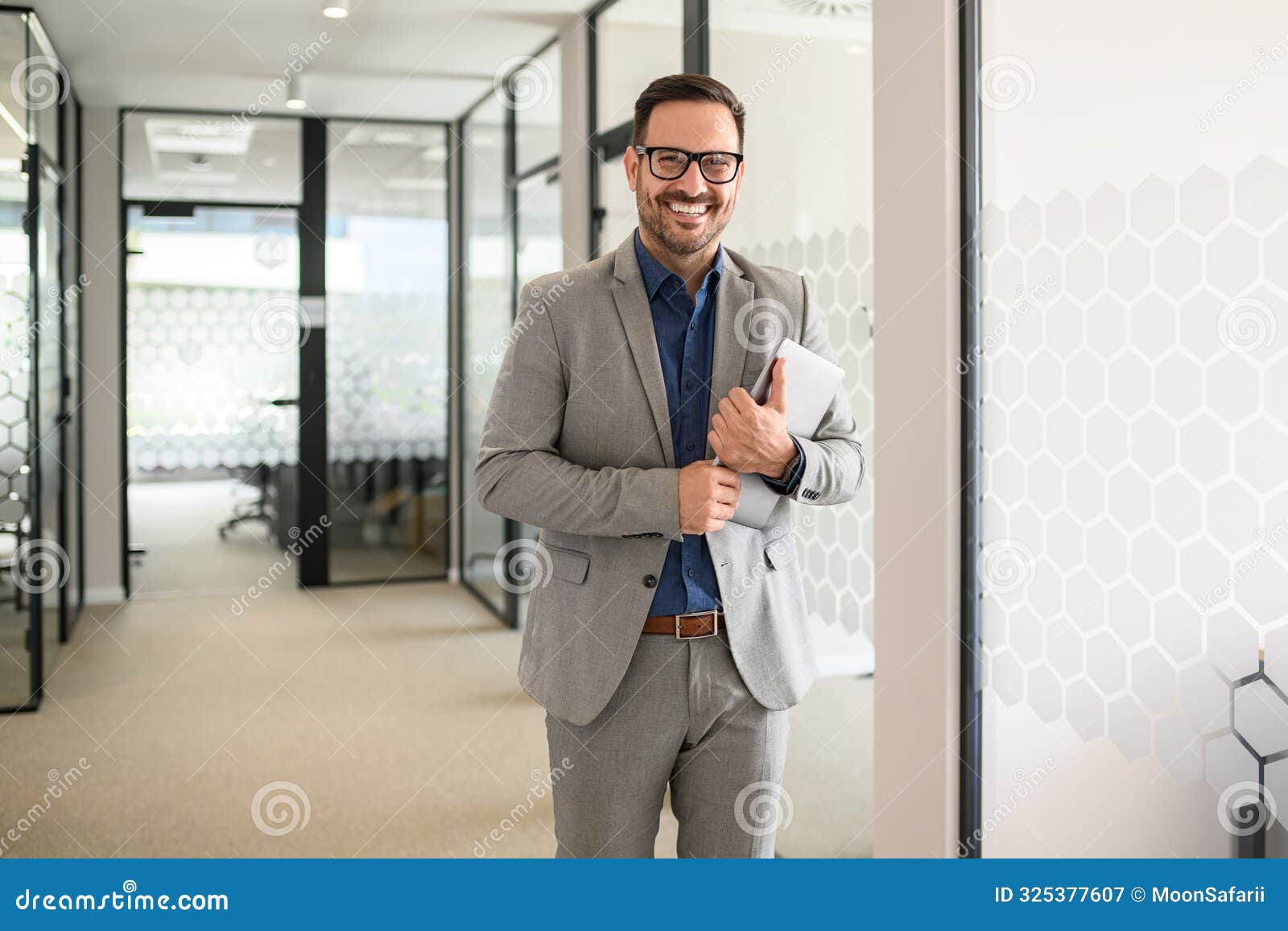 Portrait of Happy Project Manager Holding Wireless Computer and Walking ...