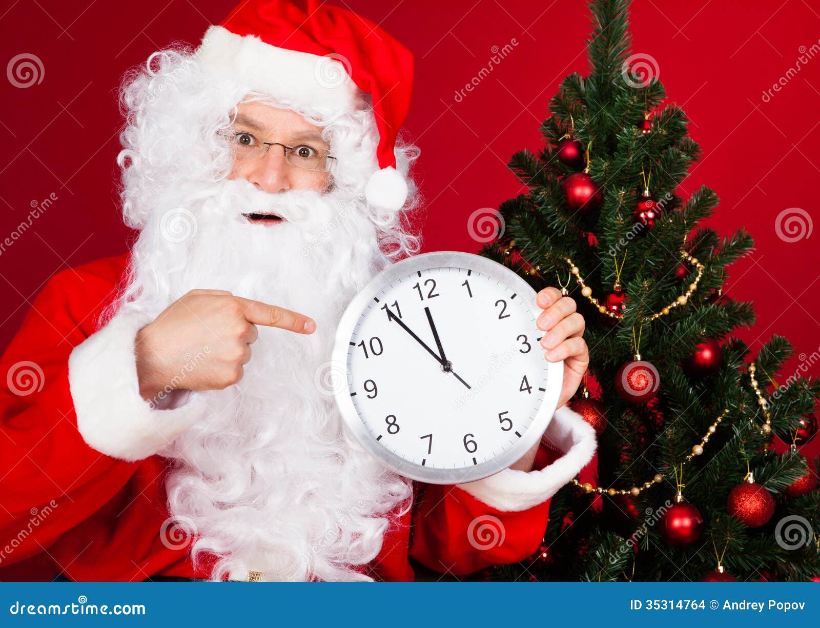 Portrait of a Happy Santa Holding Clock Stock Photo - Image of ...