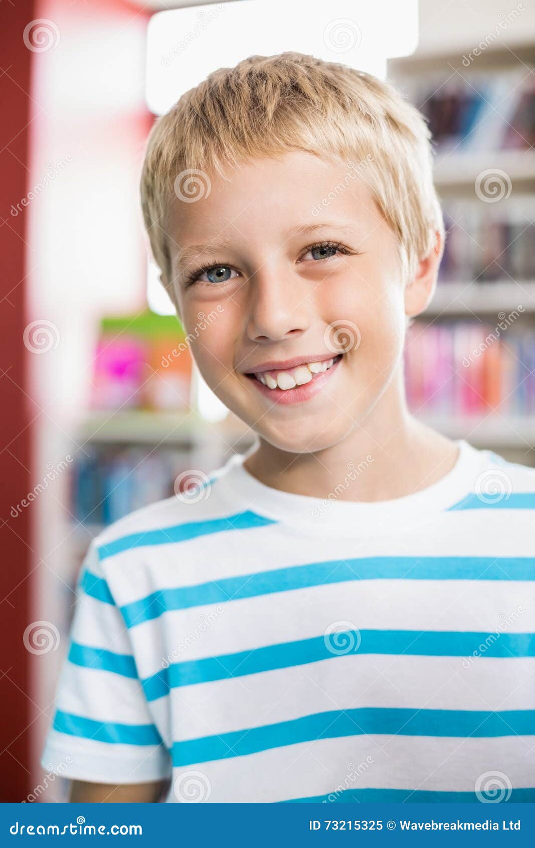 Portrait of Happy Schoolboy in Library Stock Image - Image of schoolboy ...