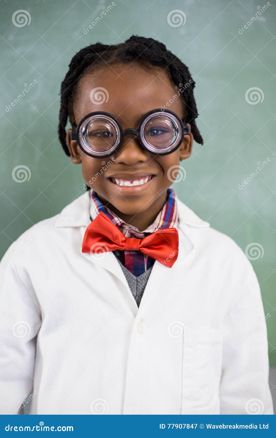 Portrait of Happy Schoolboy Smiling in Classroom Stock Image - Image of ...