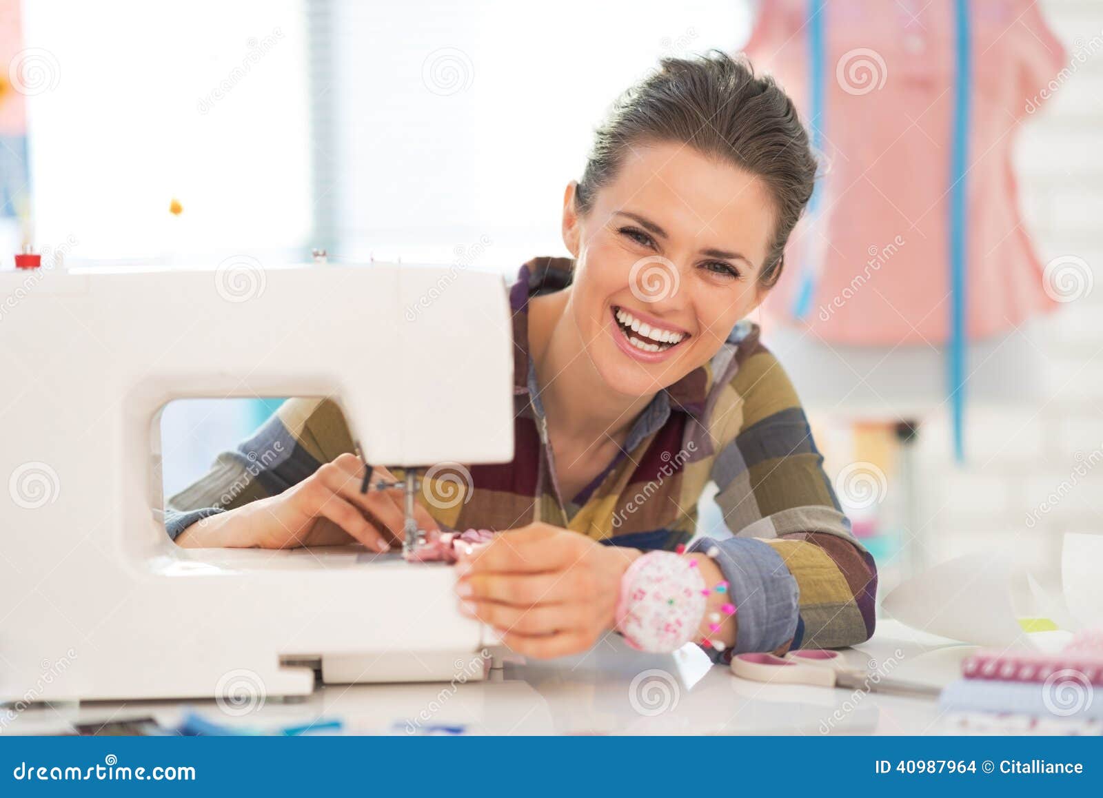 Portrait of Happy Seamstress Sewing in Studio Stock Photo - Image of ...