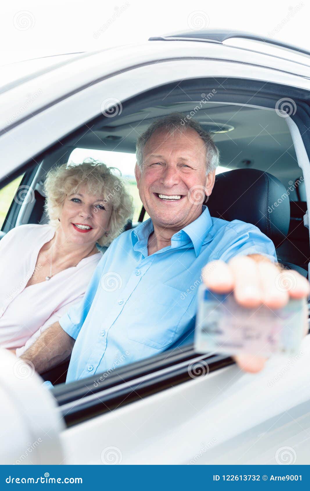 Portrait of a Happy Senior Man Showing His Driving License Stock Photo ... Portrait of a Happy Senior Man Showing His Driving License Stock Photo ...
