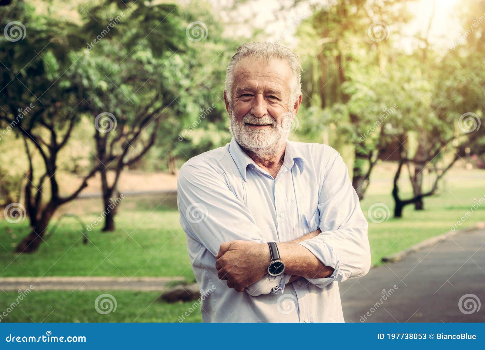 Portrait of Happy Senior Man Standing in the Park. Stock Image - Image ... Portrait of Happy Senior Man Standing in the Park. Stock Image - Image ...