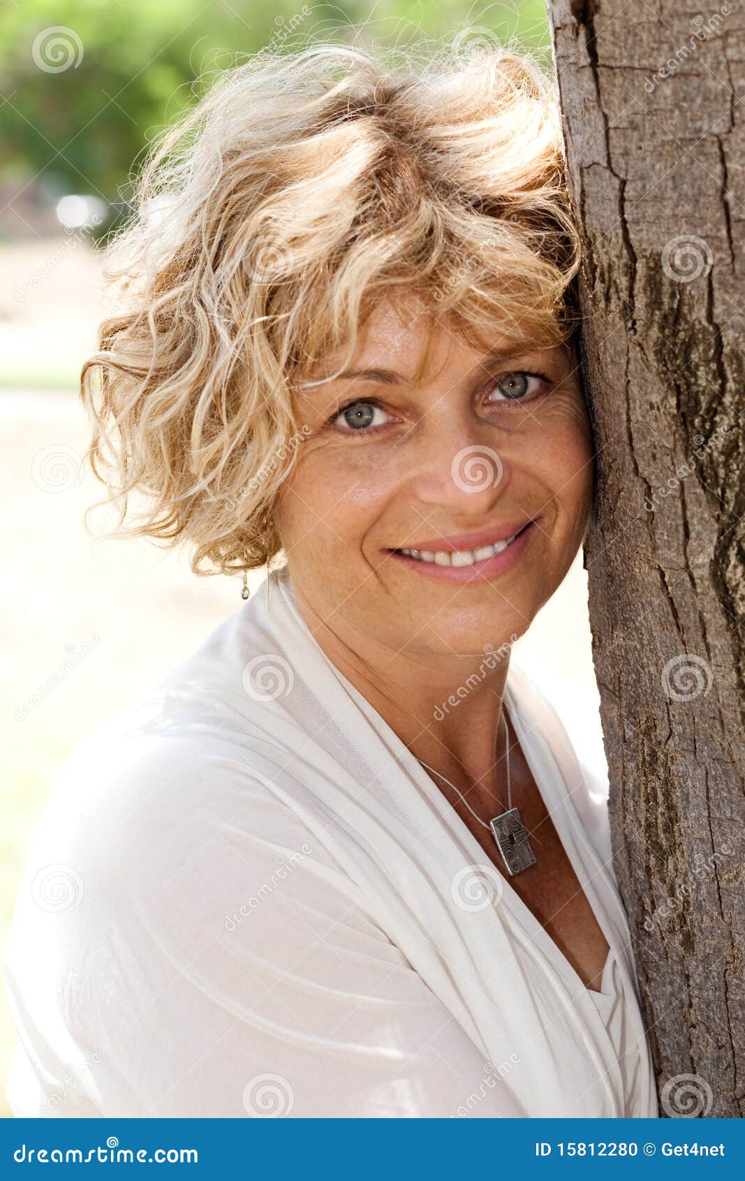 Portrait of a Happy Senior Woman Holding Tree Stock Photo - Image of ... Portrait of a Happy Senior Woman Holding Tree Stock Photo - Image of ...