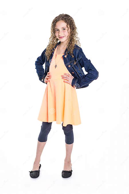 Portrait Of Happy Smiling Confident 9 Years Old Girl With Curly Hair