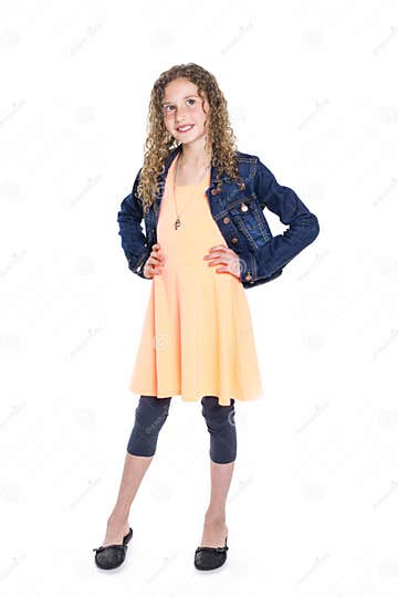 Portrait Of Happy Smiling Confident 9 Years Old Girl With Curly Hair