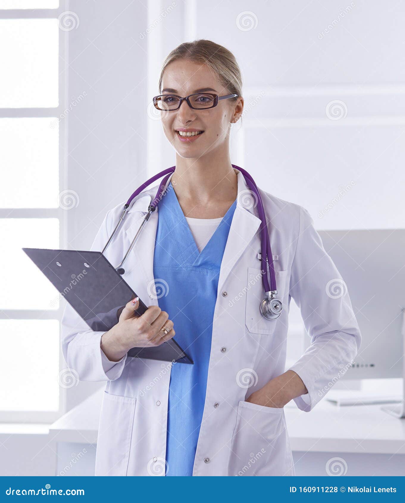 Portrait of a Happy Smiling Young Doctor in Headset in Office Stock ...