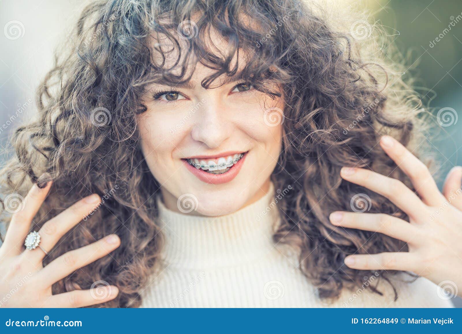 Portrait of a Happy Smiling Young Woman with Dental Braces and and ... Portrait of a Happy Smiling Young Woman with Dental Braces and and ...