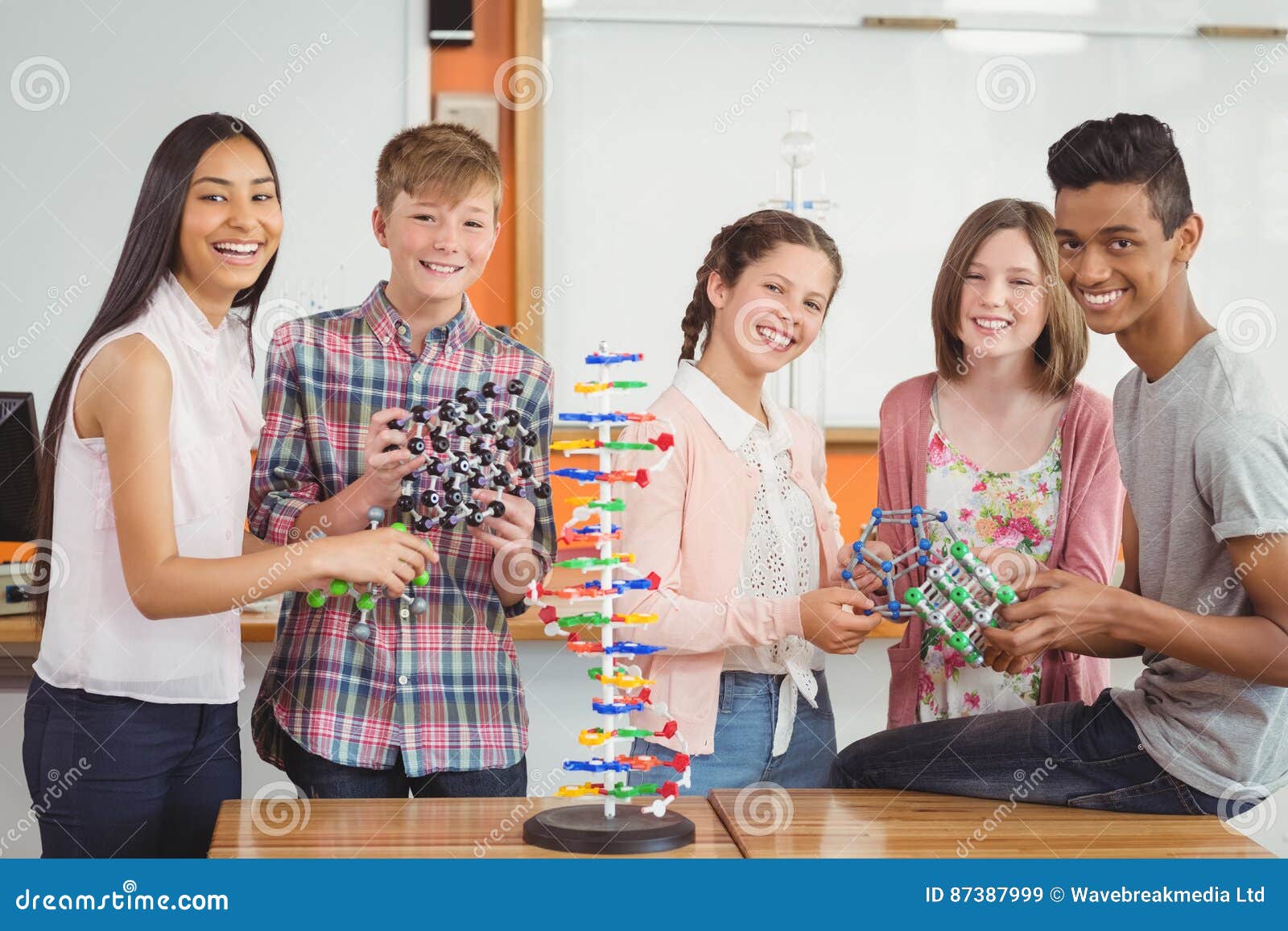 Portrait of Happy Students Experimenting Molecule Model in Laboratory ...