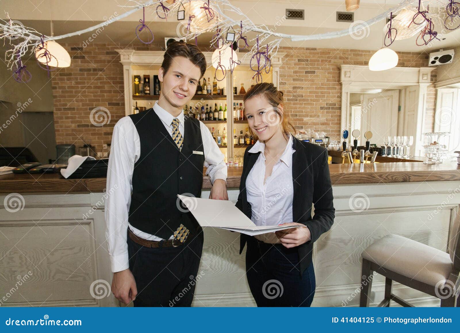 Portrait of Happy Waiter and Waitress in Restaurant Stock Image - Image ...