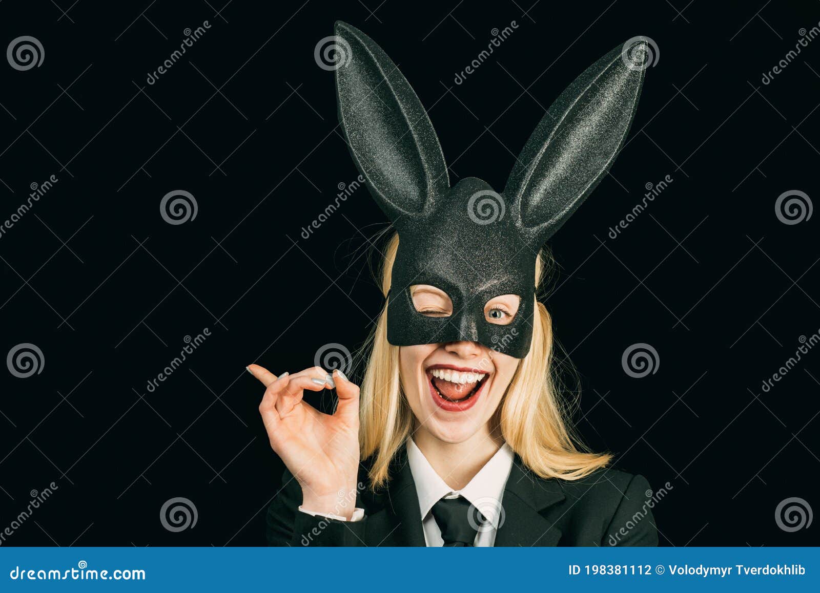Portrait Of A Happy Woman In Bunny Ears Winking Young Girl Easter