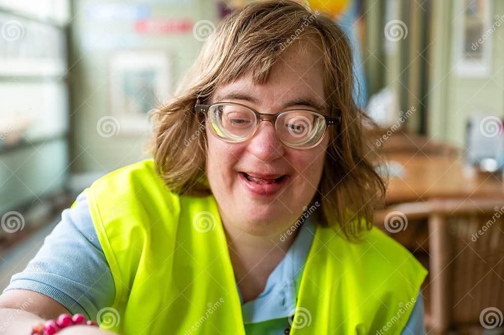 Portrait Of A Happy 40 Yo Woman With The Down Syndrome Belgium Stock