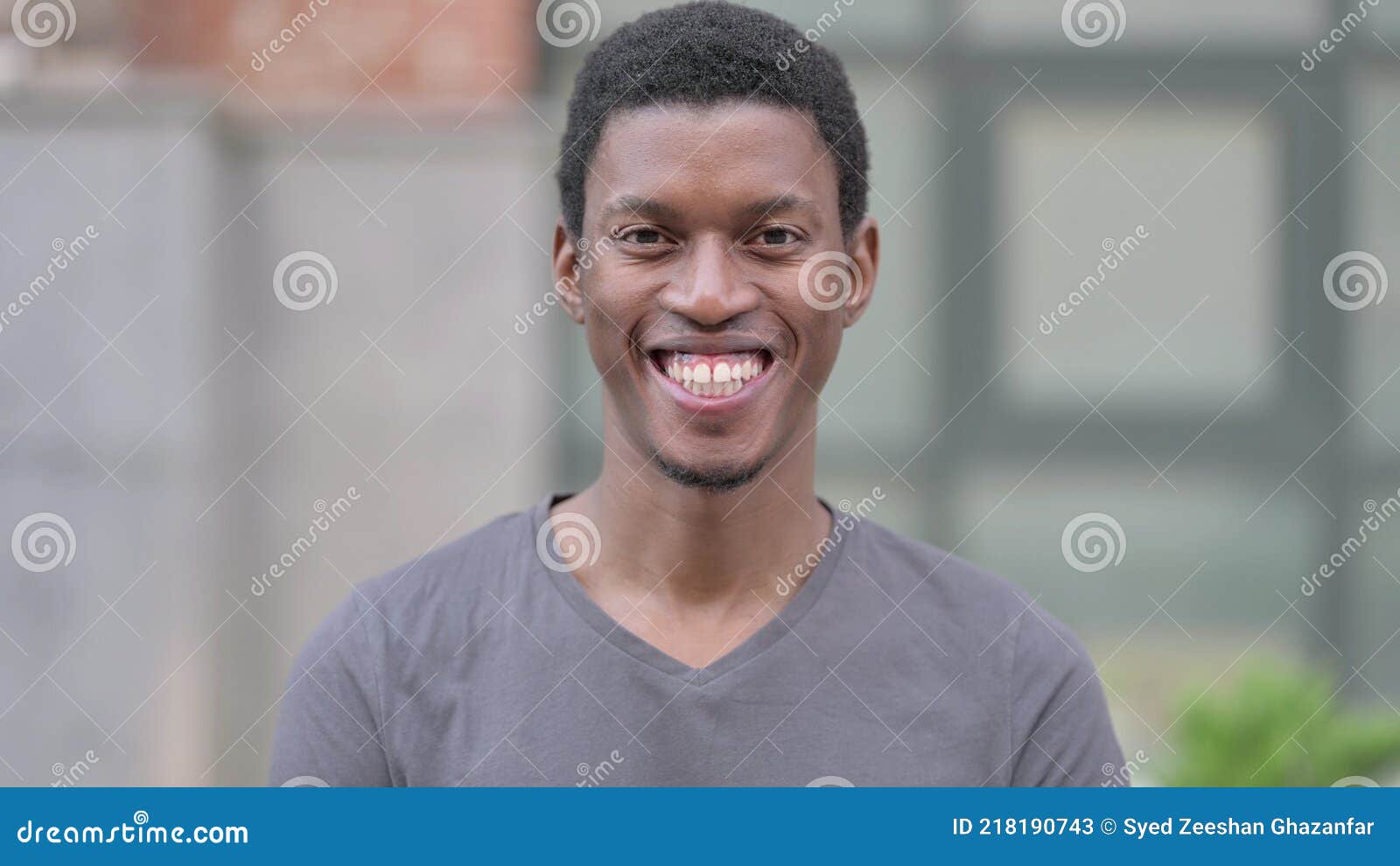 Portrait of Happy Young African Man Smiling at Camera Stock Image ...