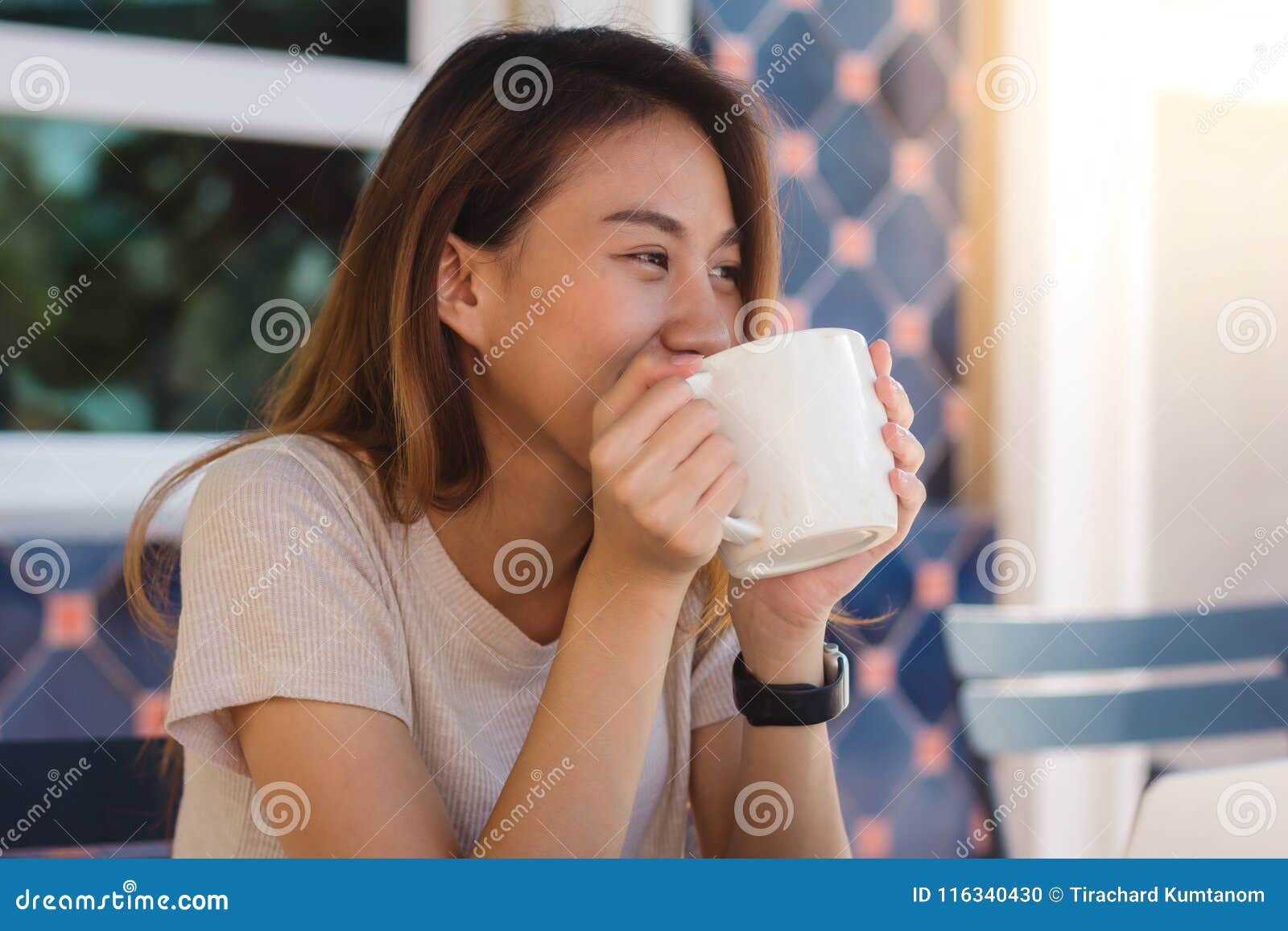Portrait of Happy Young Asian Business Woman with Mug in Hands Drinking ... Portrait of Happy Young Asian Business Woman with Mug in Hands Drinking ...